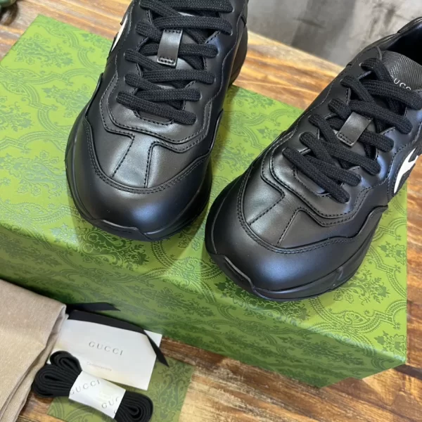 GUCCI RHYTON SNEAKERS IN BLACK